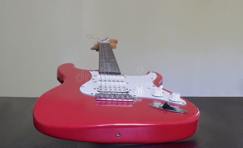 Six-string Electric Guitar on a Black Table Stock Image - Image of band ...