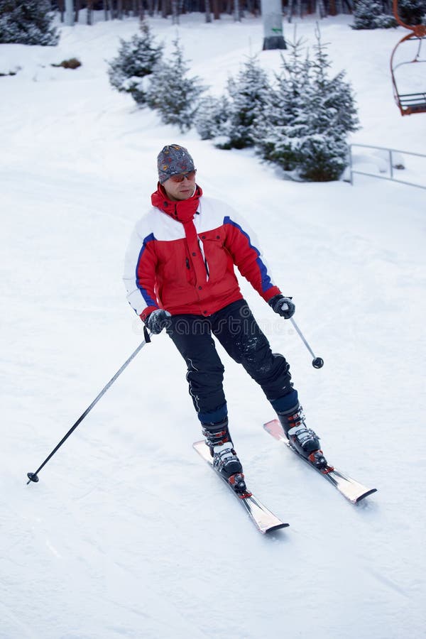 Red skier stock photo. Image of resort, speed, season - 7674782
