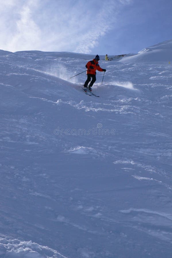 Red skier in powder snow, stock photo. Image of mountains - 5044098