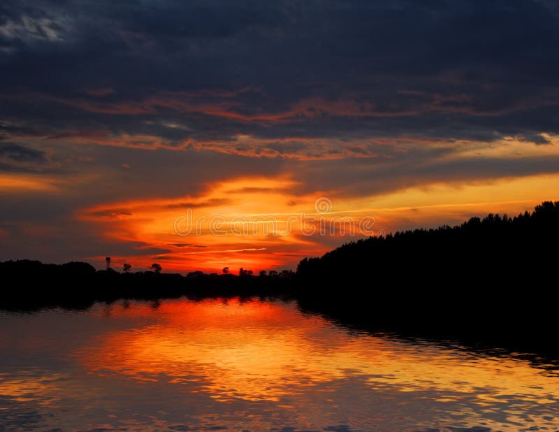 Red sky over forest lake stock photo. Image of tree, colorful - 20484004