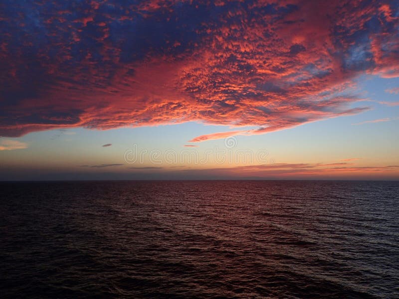 Red sky after sea sunset stock photo. Image of sunset - 70872468