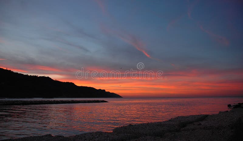 Red sky in sunset - Italy stock photo. Image of love, sail - 1560310