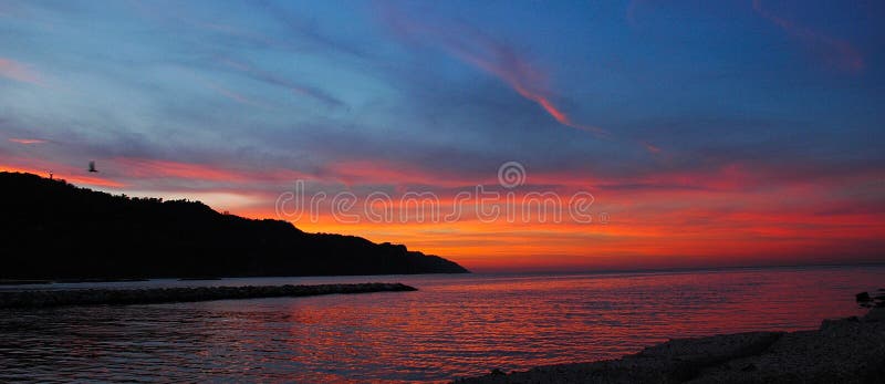 Red sky in sunset - Italy stock photo. Image of love, sail - 1560310