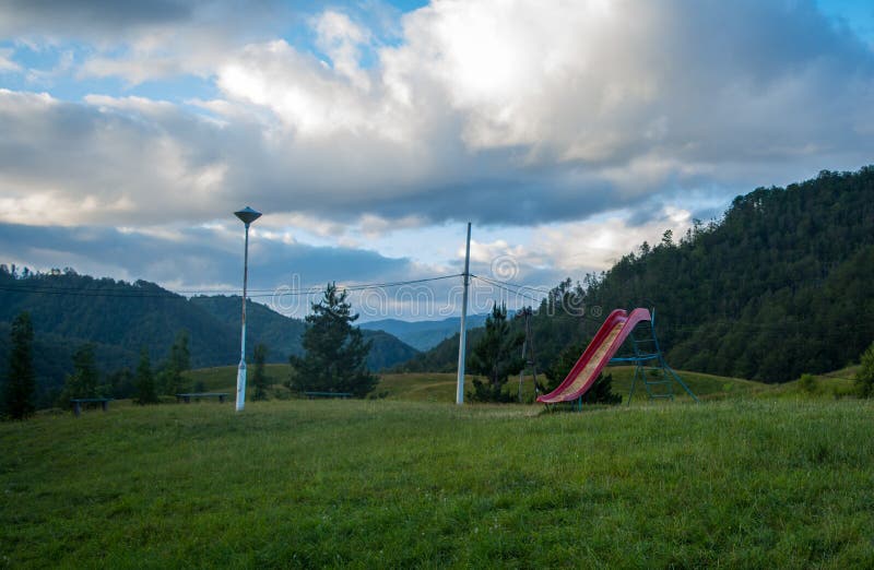 Red slide in nature stock image. Image of mountain, summer - 74470889