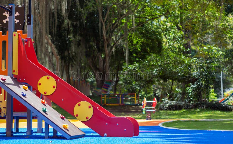 Red Slide in a Park in Summer Stock Image - Image of forest, organic ...