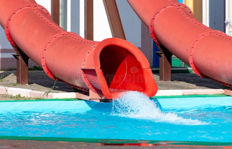 Red Slide in the Pool of the Water Park Stock Photo - Image of holiday ...