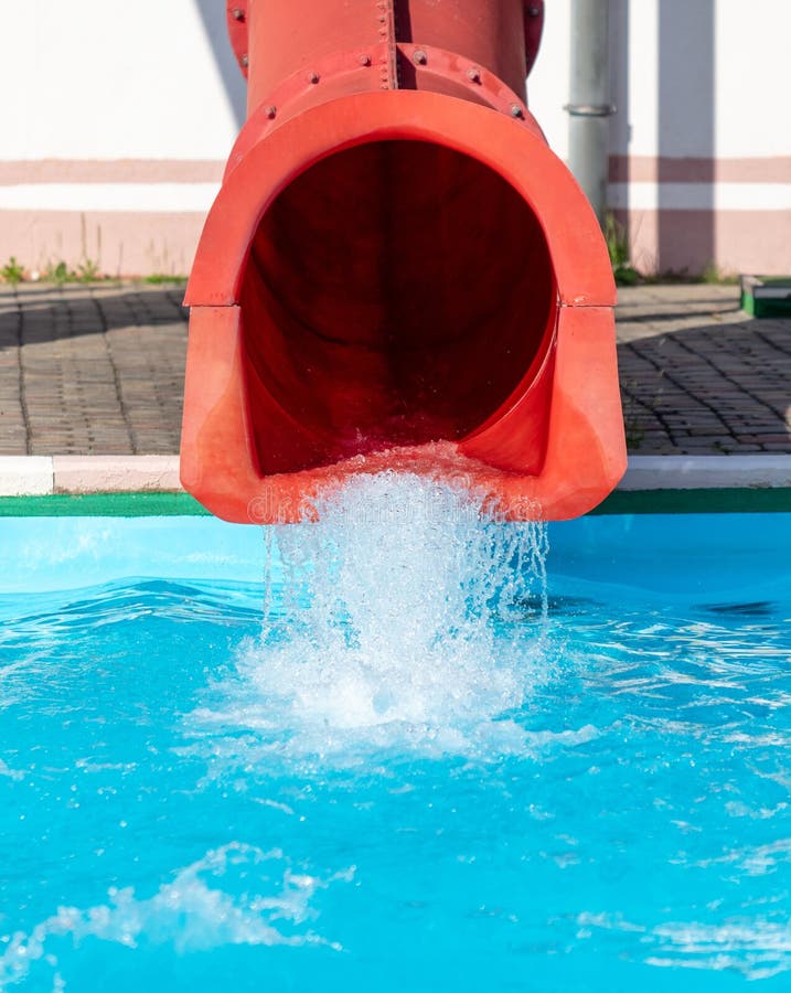 Red Slide in the Pool of the Water Park Stock Photo - Image of slide ...