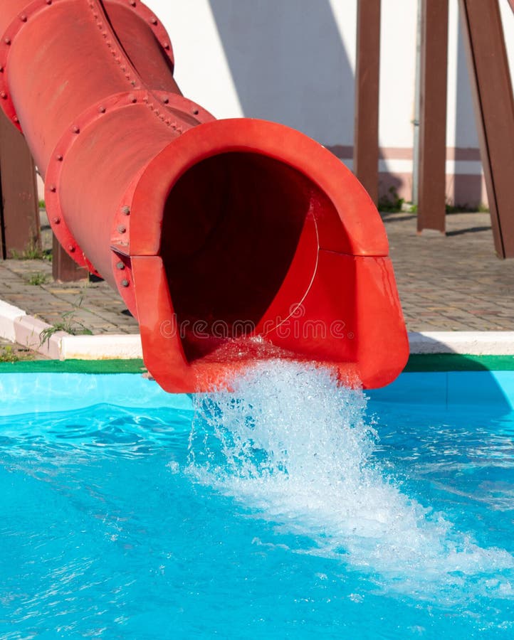 Red Slide in the Pool of the Water Park Stock Photo - Image of child ...