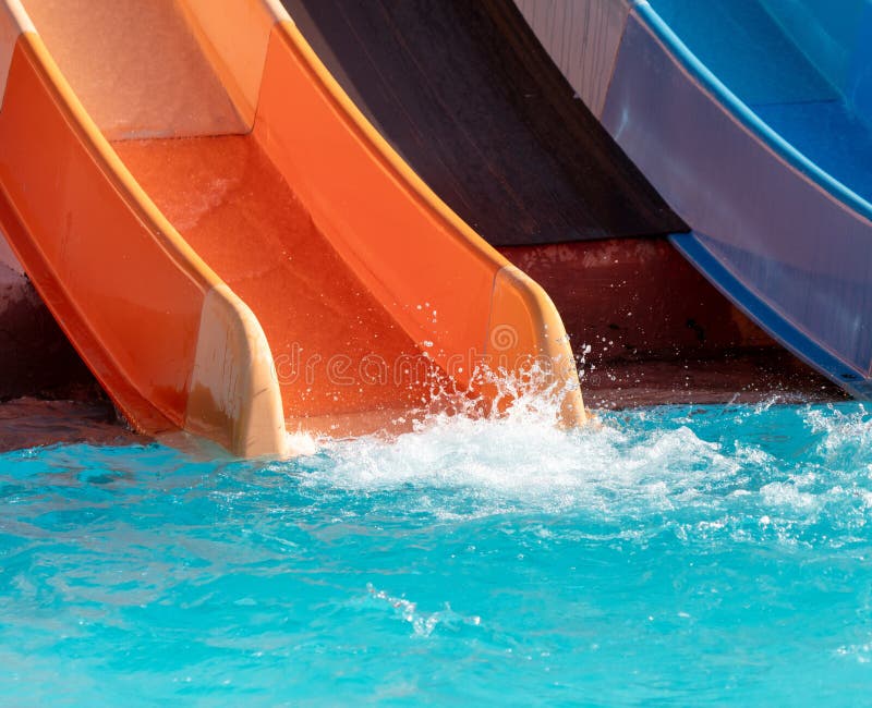 Red Slide in the Pool of the Water Park Stock Photo - Image of water ...
