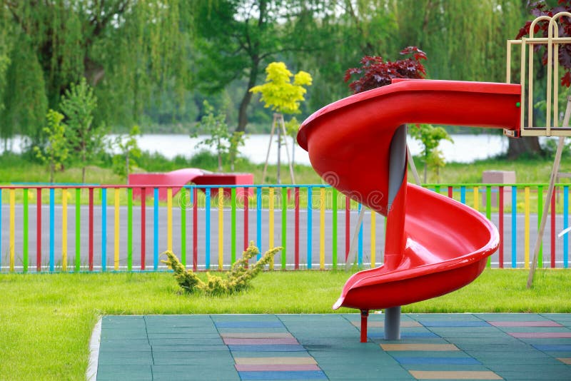Red Slides in the Playground Stock Photo - Image of recreation, leisure ...