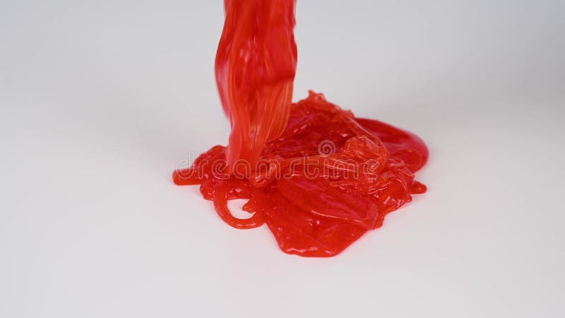 Red Slime Flowing Down on a White Background. Stock Footage - Video of ...