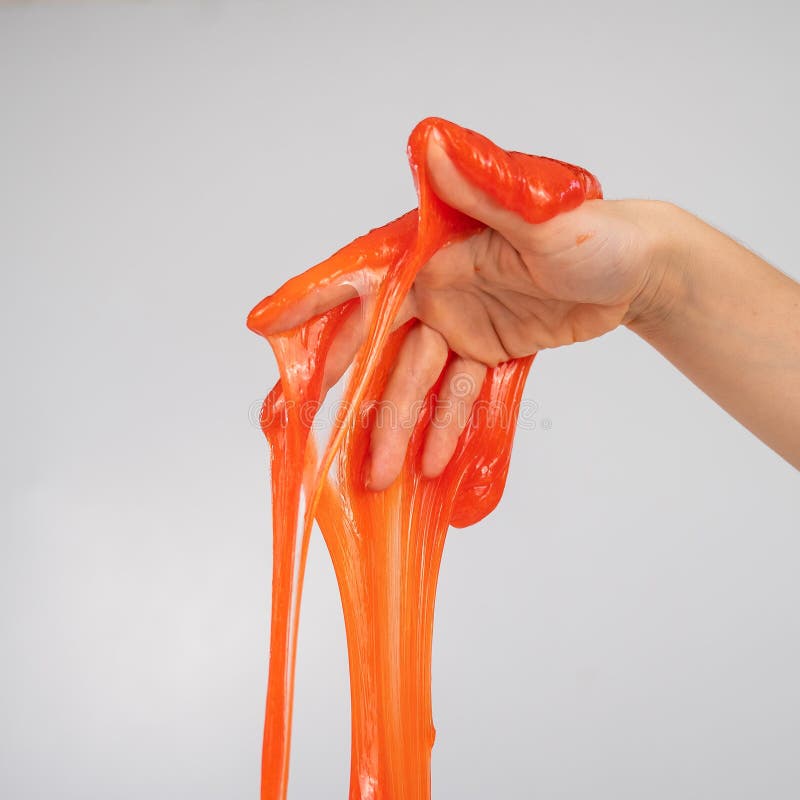 Red Slime Flowing Down from a Woman S Hand on a White Background. Stock ...