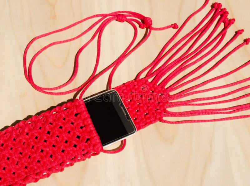 Red Small Bag Knitted Using Macrame Technique for a Mobile Phone Stock ...