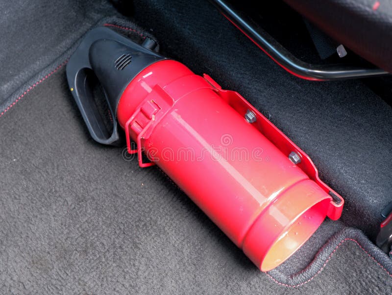 Red Small Fire Extinguisher in the Car for Safety and Prevent Fire ...