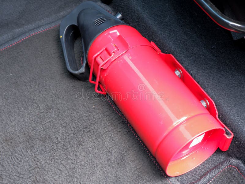 Red Small Fire Extinguisher in the Car for Safety and Prevent Fire ...