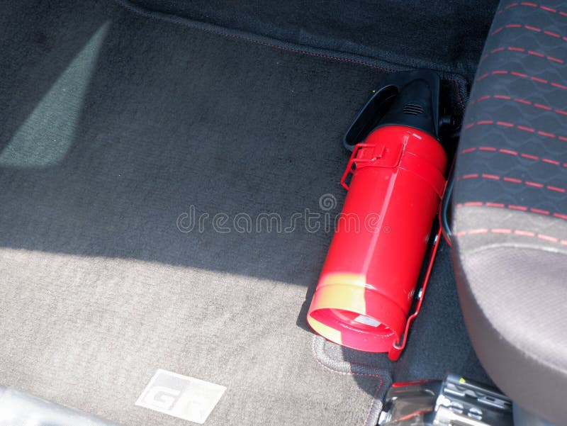 Red Small Fire Extinguisher in the Car for Safety and Prevent Fire ...