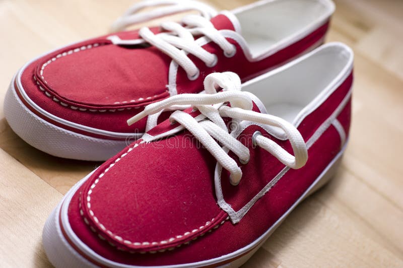 Red Sneakers on Sandy Beach Stock Image - Image of daylight, shoe: 75901509