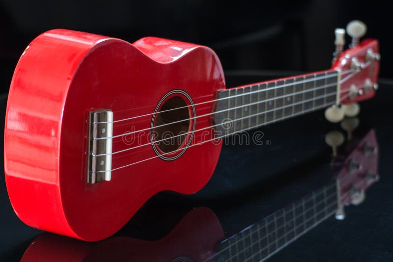 Red soprano ukulele stock image. Image of acoustic, strings - 73791239