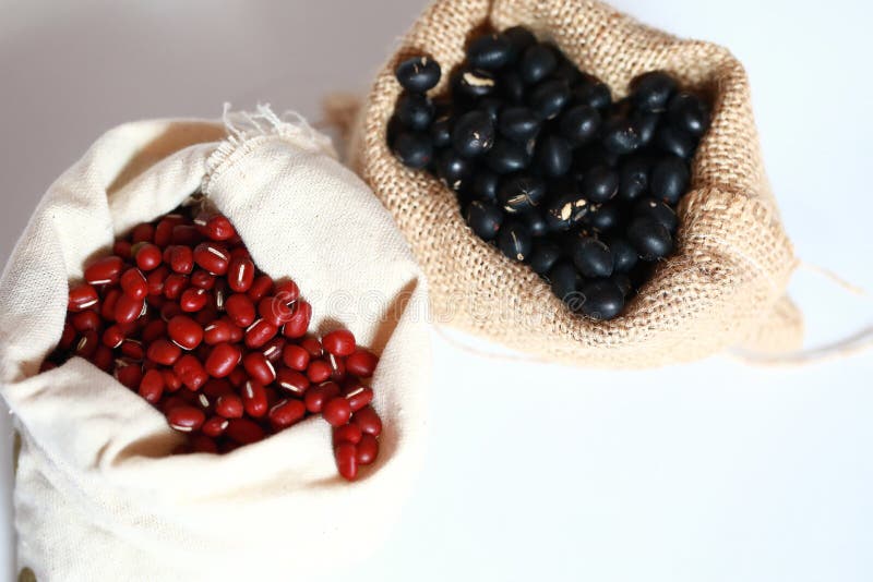 Red Soy Beans and Black Soy Beans in the Cloth Belt Stock Image - Image ...