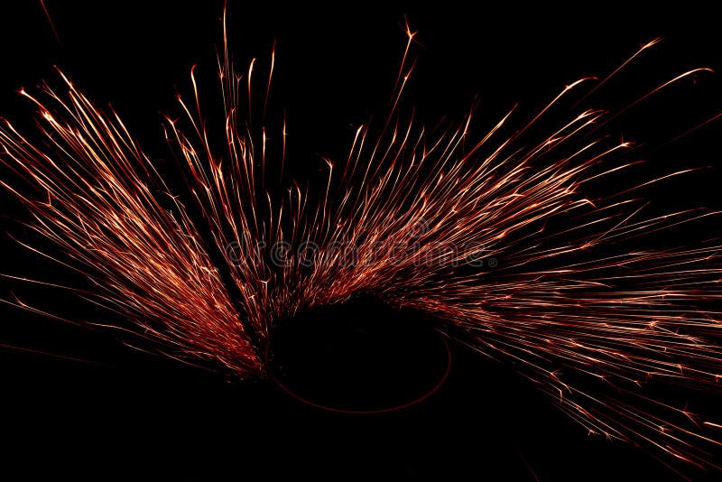 Red Sparks from the Grinder Glowing in the Dark Stock Photo - Image of ...