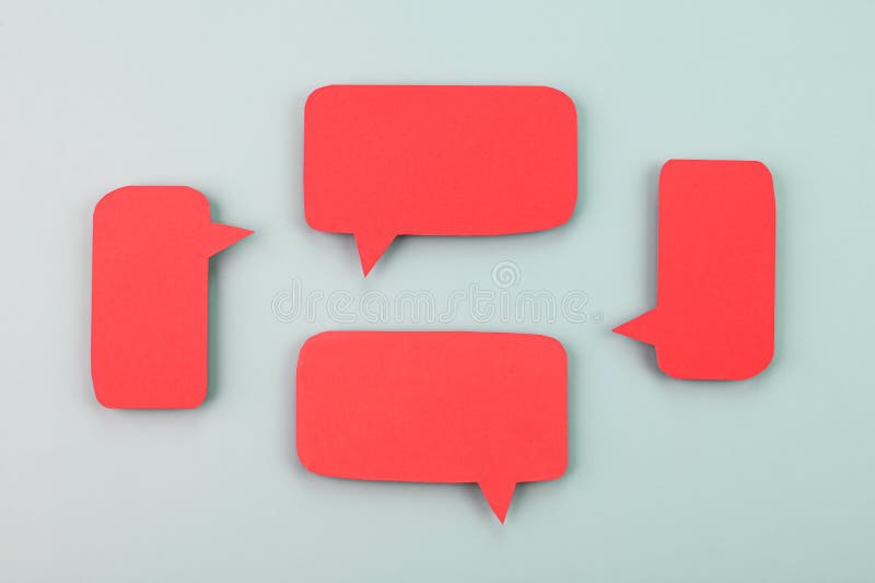 Red Speech Bubbles on a Blue Background Stock Photo - Image of ...