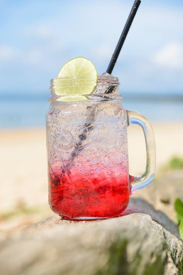 Red Spirit Drink Lemon Soda Cocktail on Beach Stock Photo - Image of ...