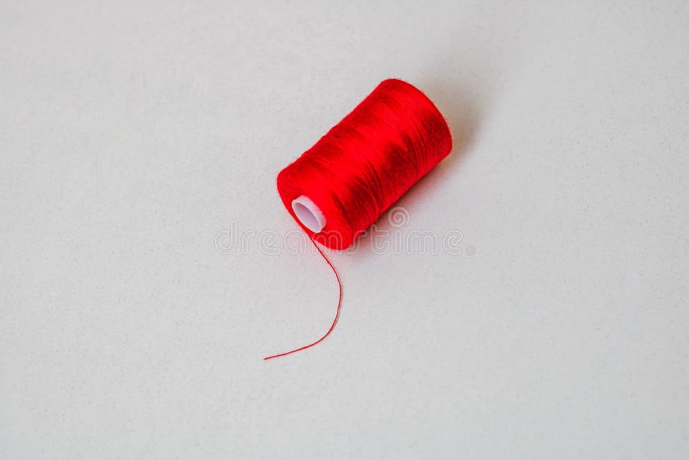 Red Spool of Sewing Thread Isolated, Close Up Stock Photo - Image of ...
