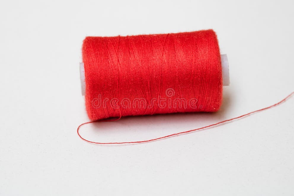 Red Spool of Sewing Thread Isolated, Close Up Stock Photo - Image of ...