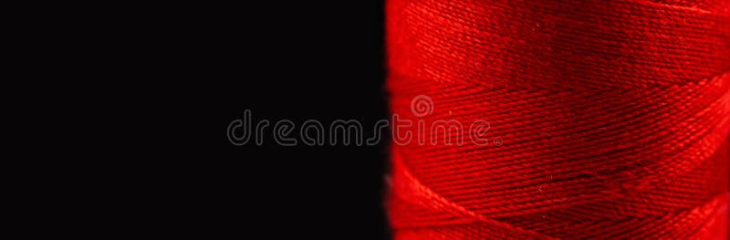Red Spool of Thread on Black Background Stock Image - Image of wood ...