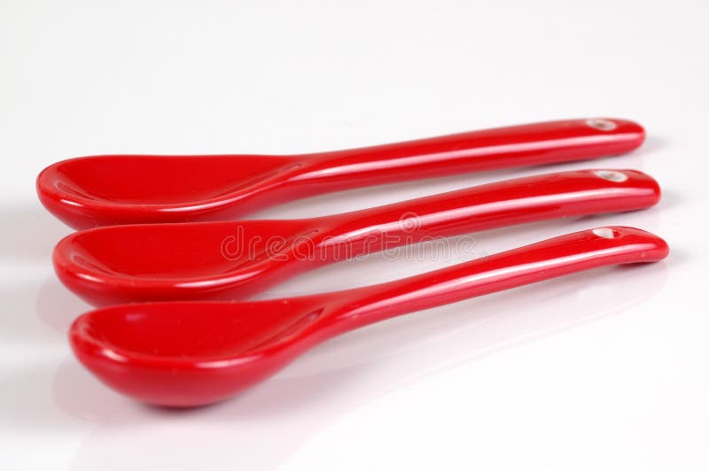 Red Spoons. stock photo. Image of stir, object, spoons - 6095998