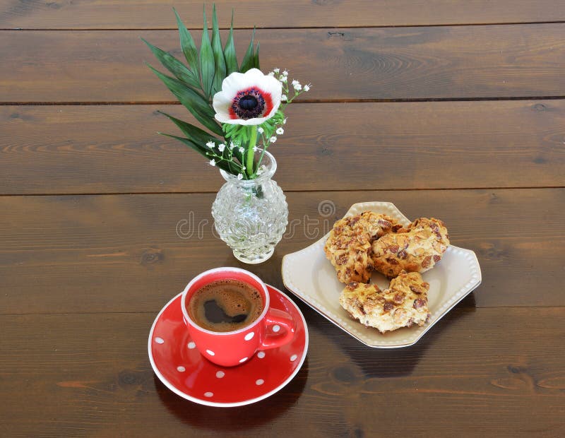 Red spotty mug and cookies stock image. Image of brown - 38779181