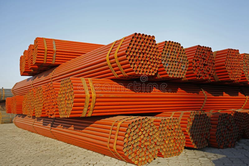 Red stacked steel pipe stock image. Image of stainless - 224374877