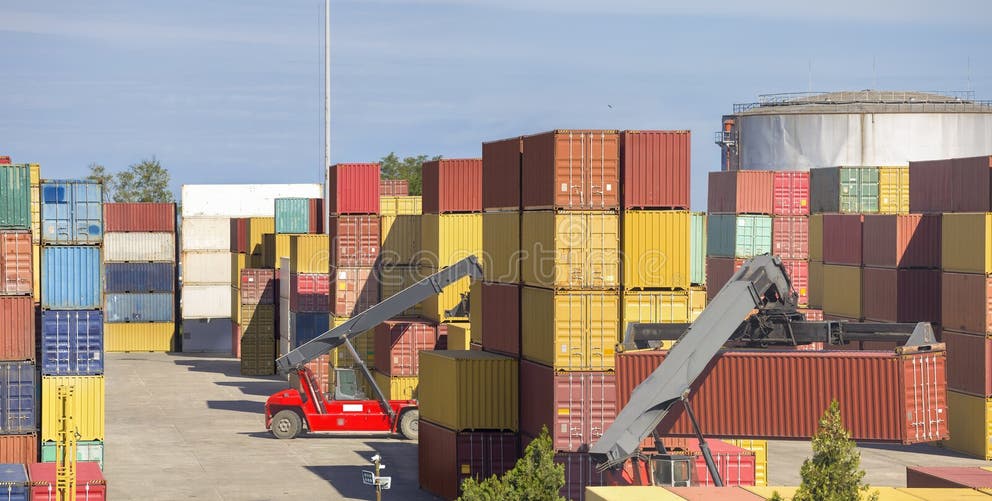 The Red Stacker Stacks Shipping Containers at the Port Warehouse ...