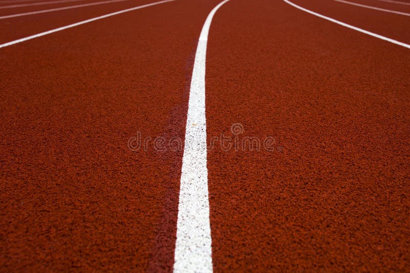 Red Stadium Running Track Closeup Stock Photo - Image of lane, start ...