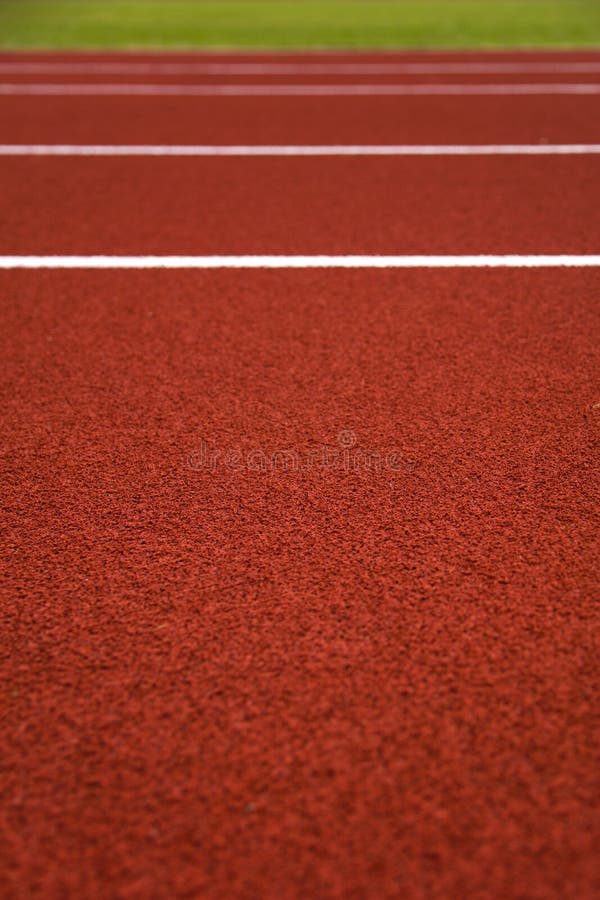 Red Stadium Running Track Closeup Stock Photo - Image of line, athletic ...