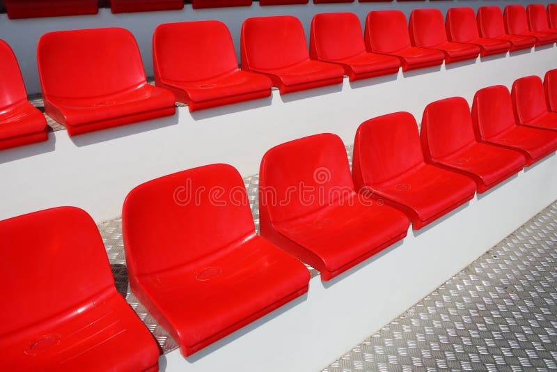 Red stadium seats stock image. Image of terraced, vacant - 5282063