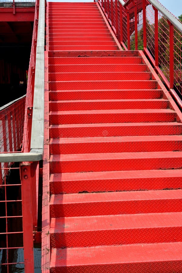 Red stage with handrail stock photo. Image of approach - 62172588