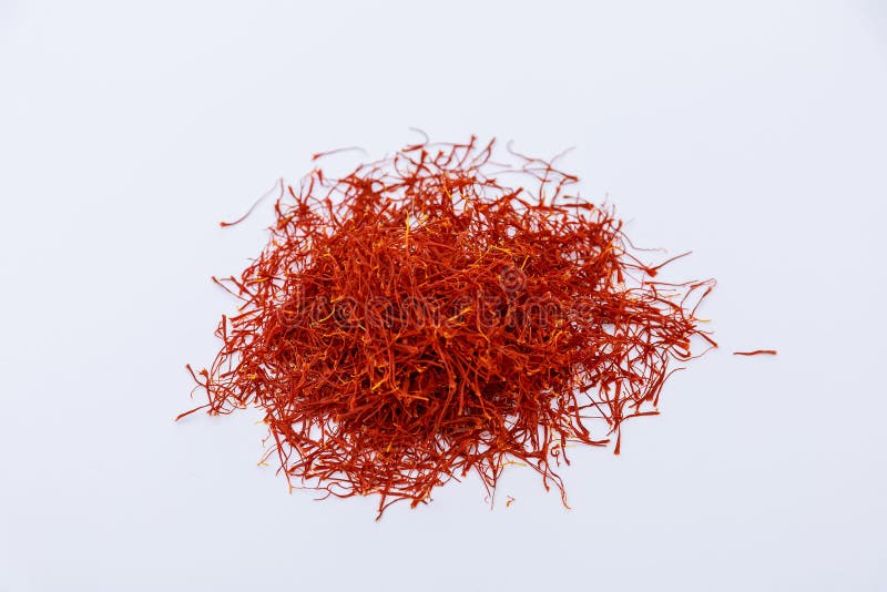 Red Stamens of Saffron on Saffron Soap on a White Background. Stock ...