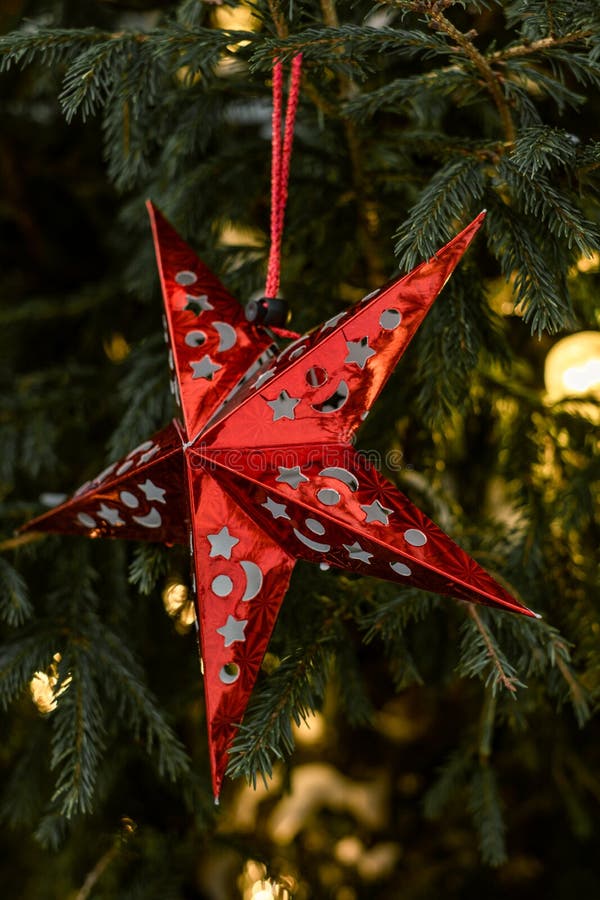 Red star on Christmas tree stock photo. Image of decorate - 237915944
