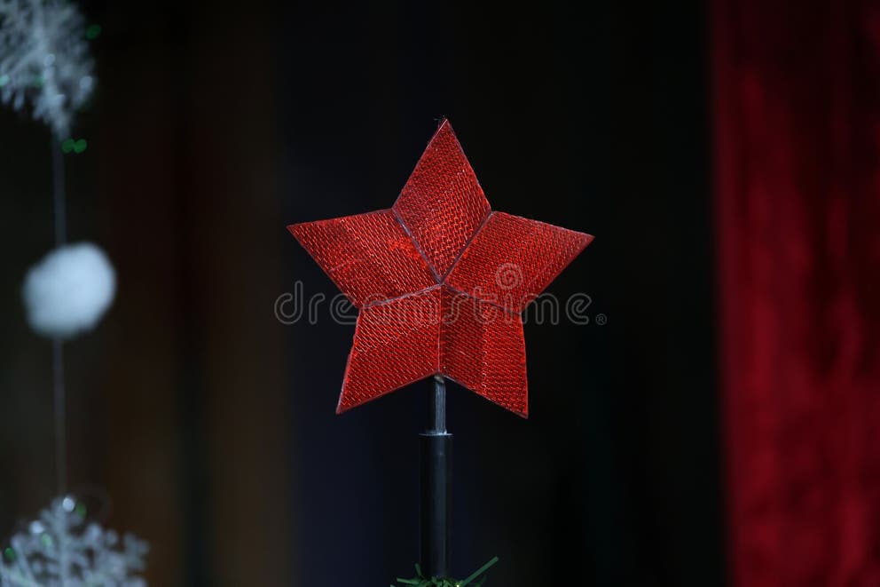 A Red Star on the Top of a Christmas Tree Stock Image - Image of ...