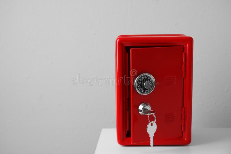 Red Steel Safe with Keys on Table. Space for Text Stock Photo - Image ...
