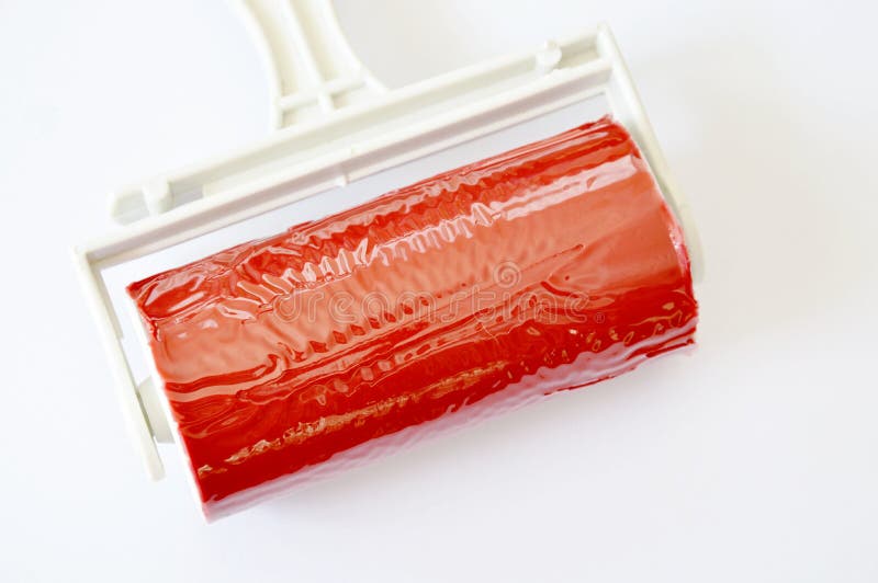 Red Sticky Dust Roller on White Background Stock Photo - Image of ...