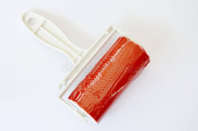 Red Sticky Dust Roller on White Background Stock Photo - Image of ...