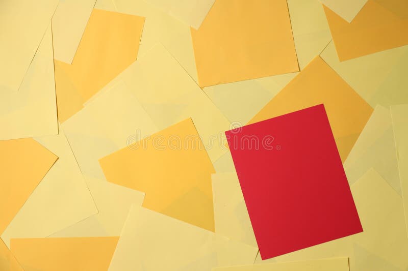 A Red Sticky Note on a Background with Bright Yellow Sticky Notes Stock ...