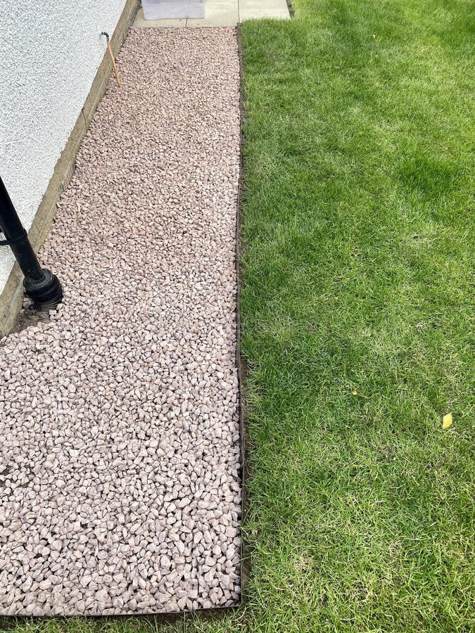 Red Stone Garden Path at Back of House Stock Image - Image of tools ...