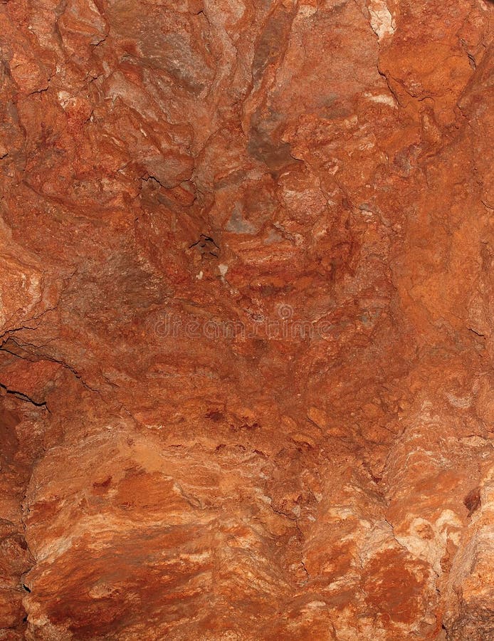 Red stone in quarry stock photo. Image of rough, quarry - 39771898