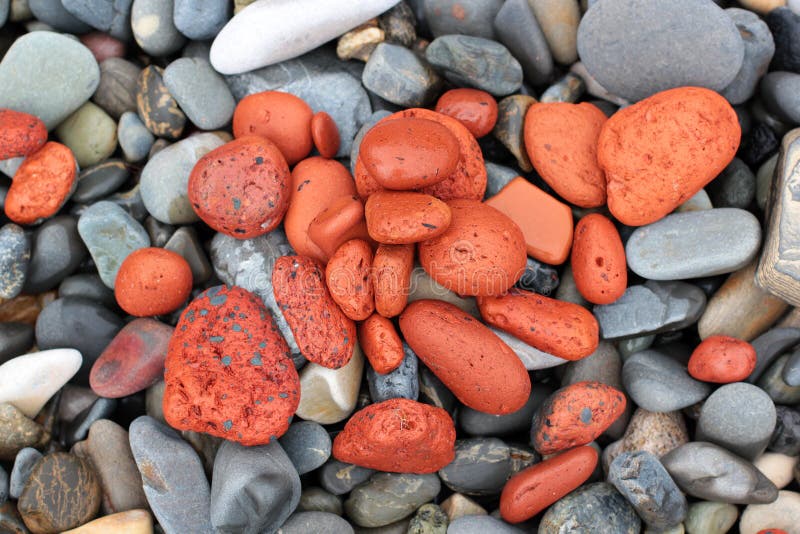 Red Stones on a Pebble Beach Background Stock Photo - Image of ...