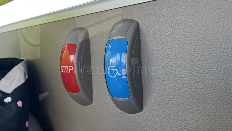 Red STOP and Blue Accessibility Symbol on a Bus Interior Wall Stock ...