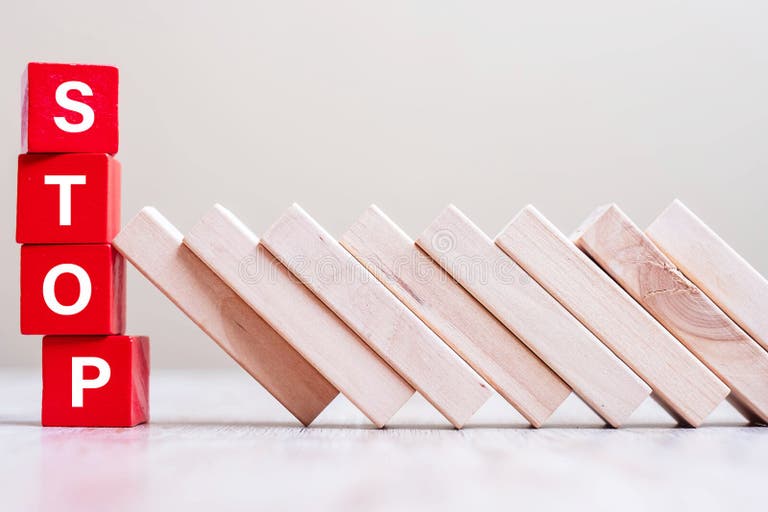 Red STOP Cube Blocks Stop Falling Blocks on Table. Fall Business ...