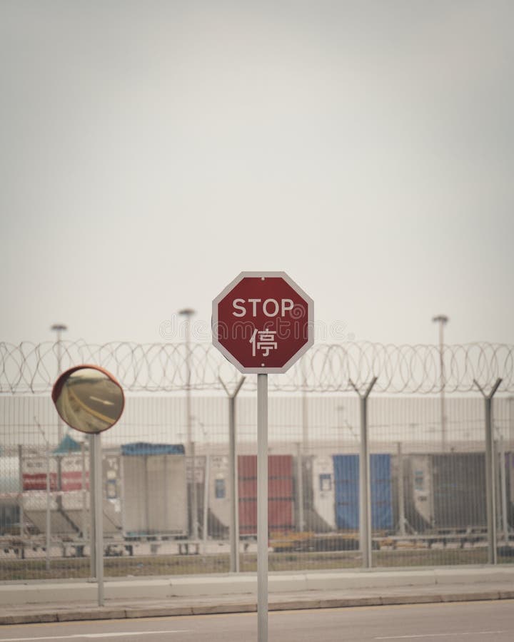Red Stop Sign Against Barbed Wire Stock Image - Image of road, barbed ...
